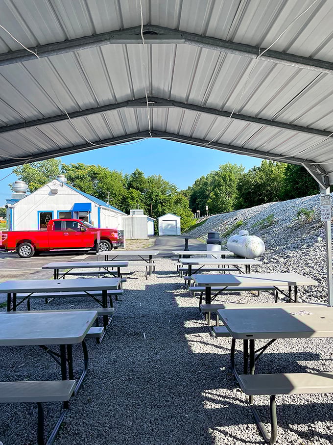 Al fresco dining, Tennessee style. Simple picnic tables under metal roofing create the perfect stage for the main attraction&mdash;what's on your plate.