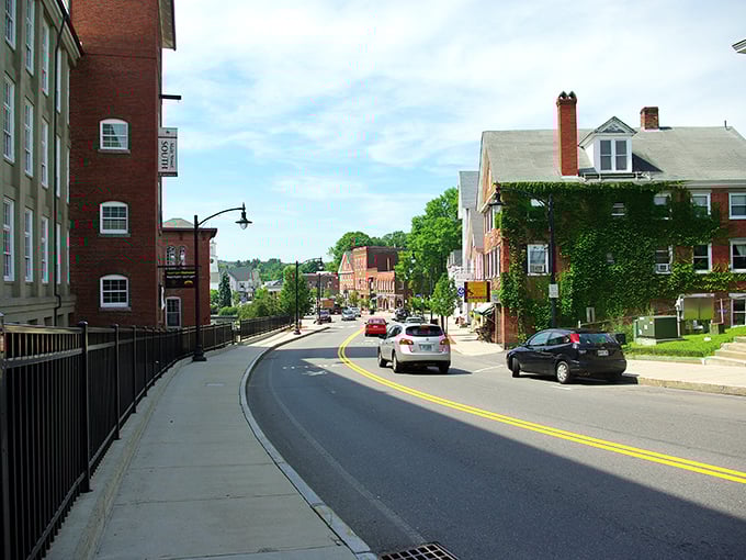 The gentle curve of Main Street reveals Newmarket's architectural timeline, where each building tells a chapter of New Hampshire history better than any textbook.