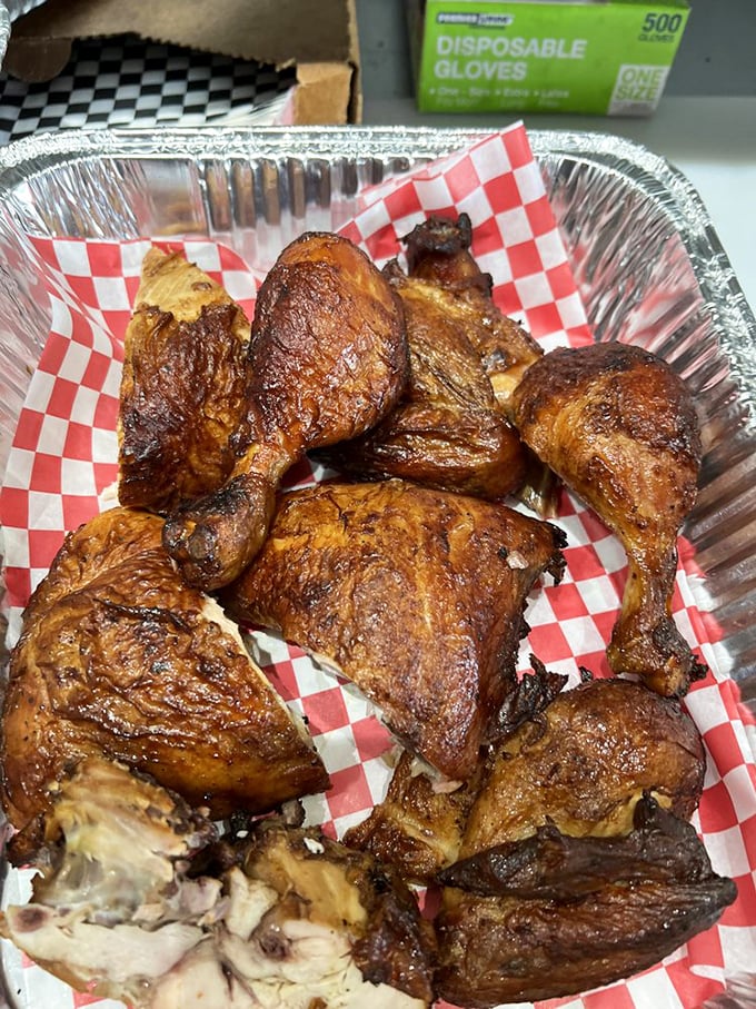 Chicken that's wearing a smoke-infused mahogany coat, proving that poultry deserves the same low-and-slow treatment as its four-legged friends.