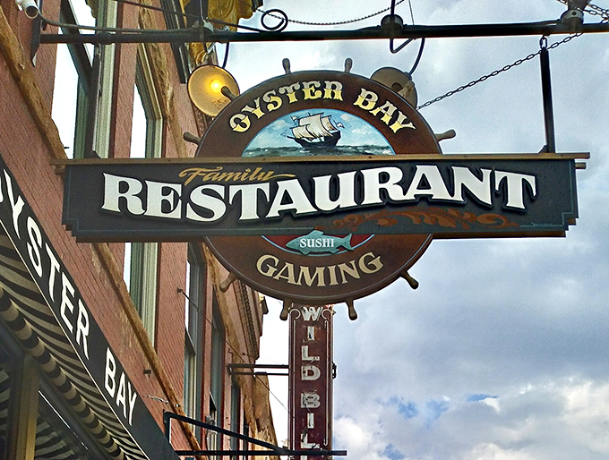 The nautical-themed sign swinging above Main Street feels like a delightful prank in a town famous for gold, gambling, and gunfights.