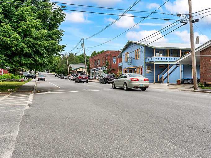 The classic New England architecture of Bethel stands against Maine's blue skies, offering affordable charm in all seasons.