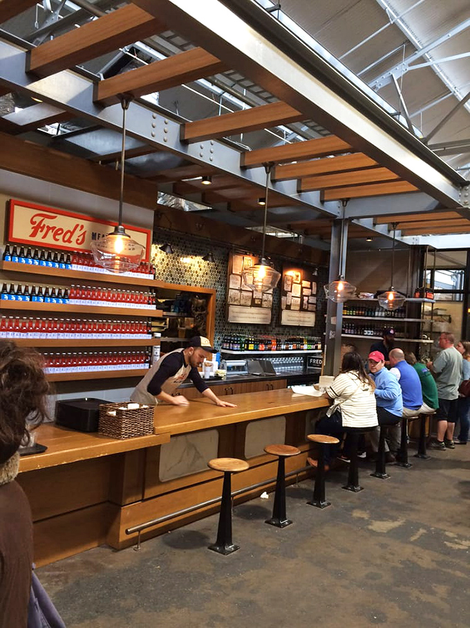 Modern industrial design meets old-school deli craftsmanship in this beautifully executed food hall gem.