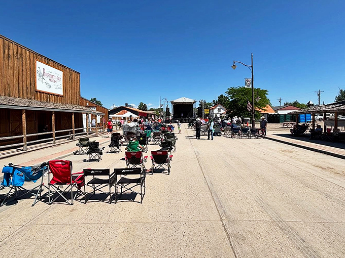 Kaycee's main street comes alive during community events, where folding chairs line up for front-row views of small-town celebrations.