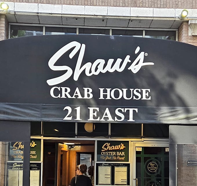 Shaw's elegant black awning whispers "seafood sophistication" in downtown Chicago. Behind that modest entrance lies oyster paradise!