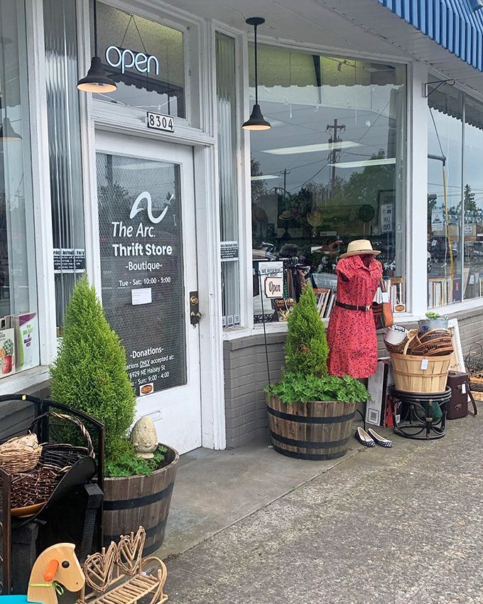 The Arc's boutique-style storefront welcomes with potted plants and promise. Small but mighty in the thrifting universe.