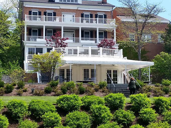 Multi-tiered porches invite relaxation at Aurora's historic inns – where rocking chair diplomacy is still practiced daily.