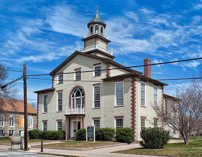 The elegant colonial courthouse stands proudly with its distinctive cupola, representing centuries of Bristol's rich American heritage and history.