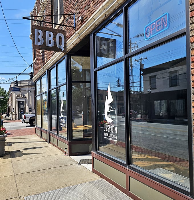 The minimalist "BBQ" sign is understated – the exact opposite of the flavor explosion waiting inside.