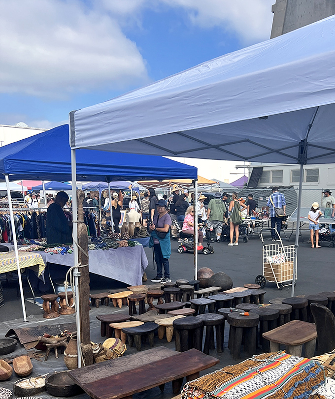 Rustic meets refined! Handcrafted wooden stools and artisanal pieces create a tactile wonderland at Long Beach Antiques Market.