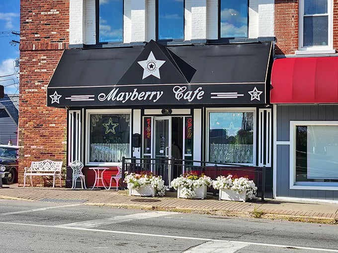 Flower boxes and outdoor seating at Mayberry Cafe &ndash; where Andy Griffith would surely approve of their legendary tenderloin.