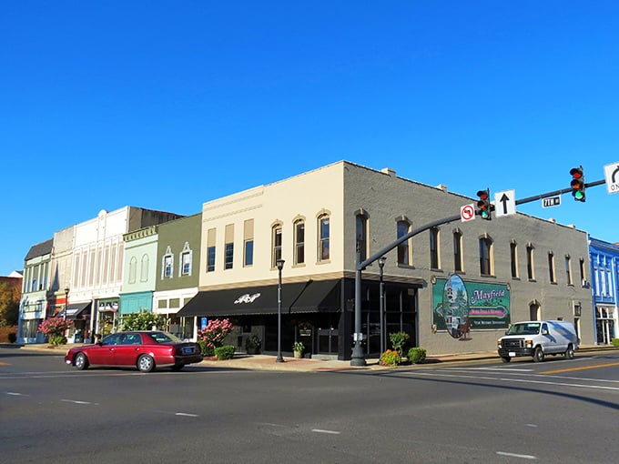 Main Street magic at its finest - colorful storefronts and friendly faces make Mayfield feel like home immediately.