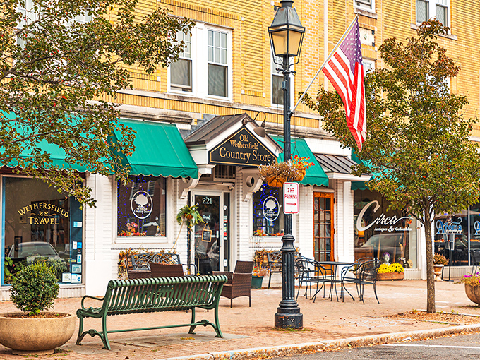 Old Wethersfield's Country Store epitomizes New England charm with its green awnings and park benches&mdash;perfect for affordable exploration.