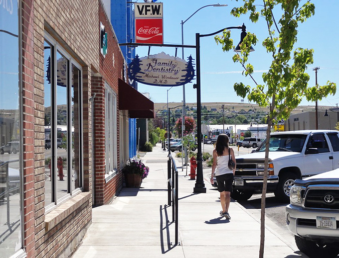 The historic VFW building anchors Polson's Main Street, where fixed-income residents enjoy lakeside living without the premium price tag.