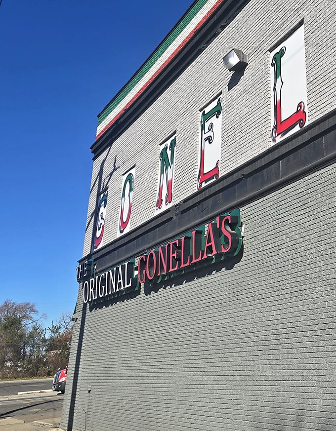 The Original Gonella&rsquo;s sign stands tall against a clear blue sky, a familiar landmark for Detroit sandwich lovers.