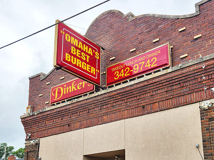 The iconic "OMAHA'S BEST BURGER" sign beckons hungry travelers like a neon lighthouse guiding ships to delicious harbor.