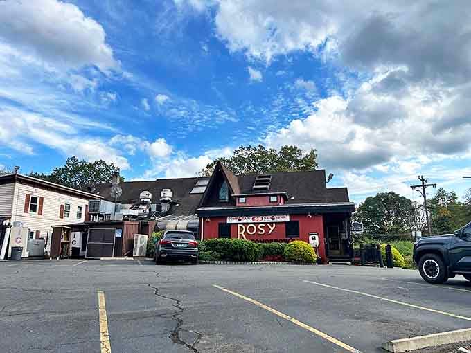 The bright red exterior of Rosy Tomorrow's stands out against Connecticut's blue sky like a culinary beacon calling hungry travelers home.