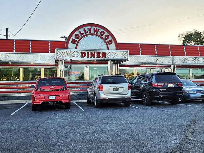 The iconic Hollywood Diner sign glows with promise against the Delaware sky, a beacon of comfort food that's drawn hungry Delawareans for generations.