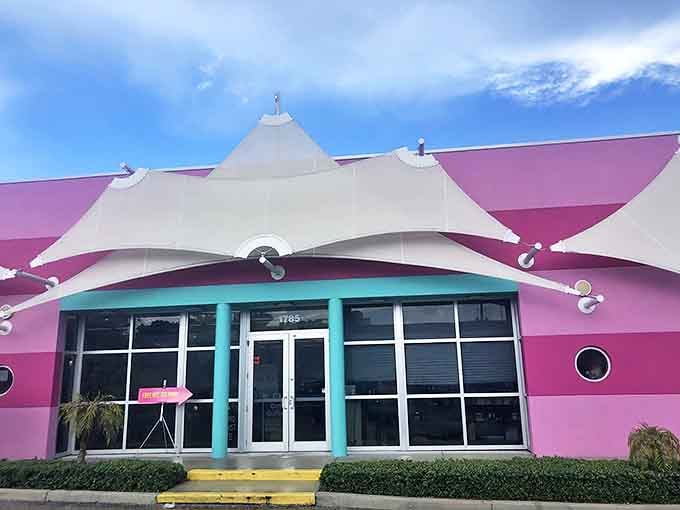 Miami Vice meets thrift store paradise! Out of the Closet's unmistakable turquoise and pink exterior stands out like a fashionable flamingo on Federal Highway.