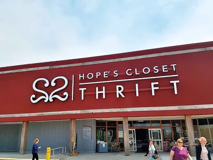 The burgundy storefront of Hope's Closet stands like a beacon for bargain hunters, promising treasures behind its welcoming glass doors.