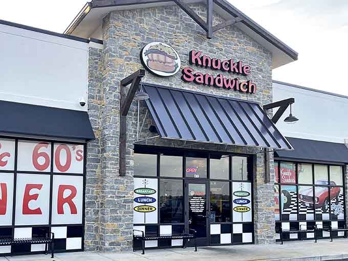 The stone facade and bold "50's & 60's DINER" signage of The Knuckle Sandwich welcomes hungry visitors to this Bargersville time capsule.