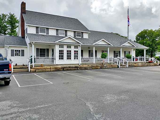 The stately white exterior of Crossroads beckons like a friend waving you over for dinner – complete with wraparound porch perfect for post-tenderloin contemplation.
