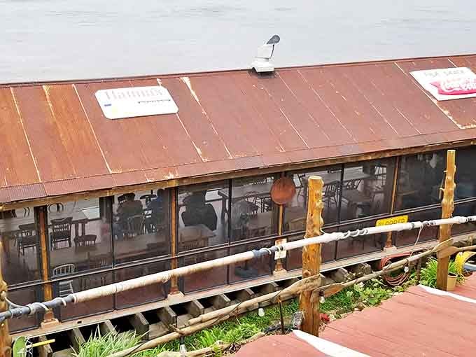 Perched right on the Mississippi like a weathered postcard come to life, the Fish Shack's rustic metal roof and screened-in dining area promise river views with every bite.