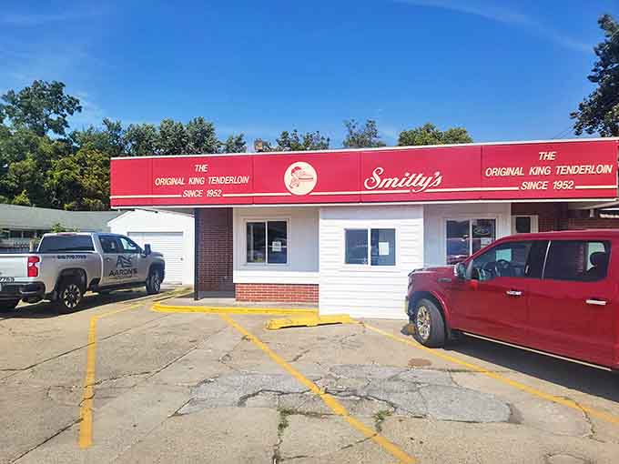 The iconic red awning of Smitty's proudly announces its tenderloin heritage, welcoming hungry visitors to this Des Moines institution.
