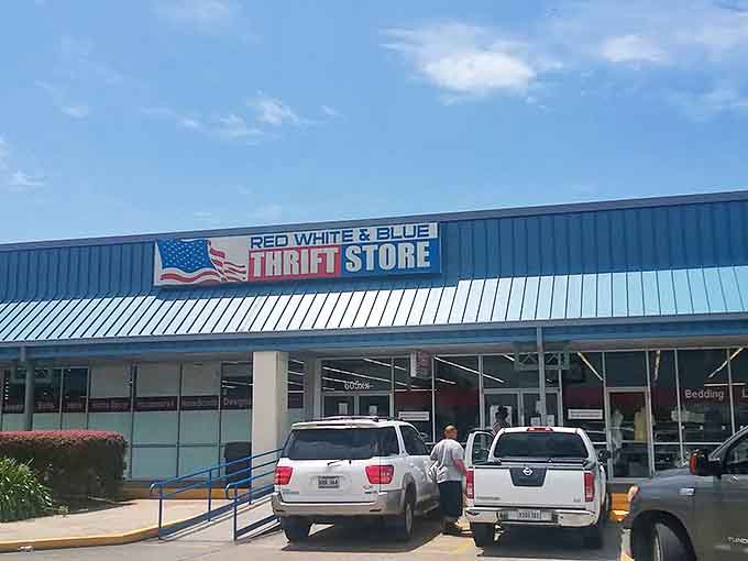 The patriotic blue exterior beckons bargain hunters like a siren song, promising treasures inside that won't break the bank.