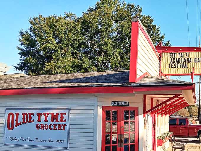 Morning sunshine bathes the iconic storefront, where that vintage marquee has announced everything from football victories to hurricane survival. Lafayette's living history.