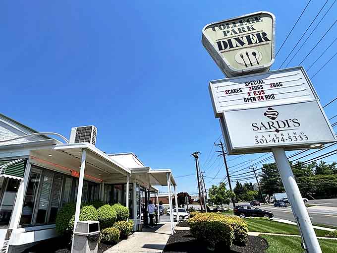 The iconic College Park Diner sign stands tall against the Maryland sky, beckoning hungry travelers with promises of 24-hour comfort food.
