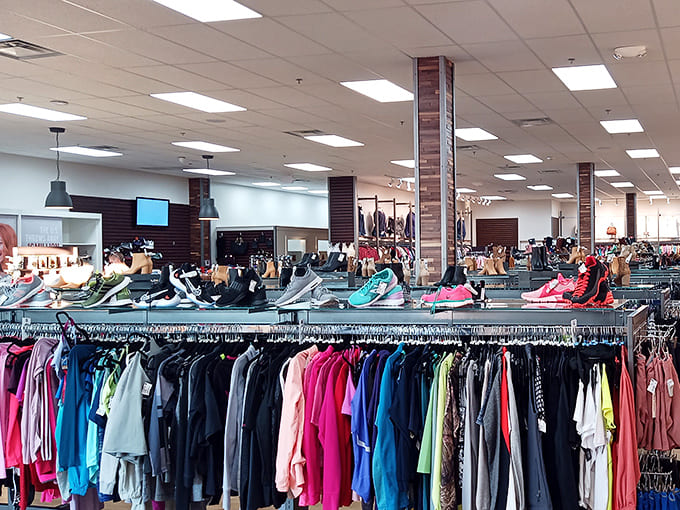 Uptown Cheapskate's spacious interior showcases well-organized racks of colorful clothing and shoes, creating a boutique feel without boutique prices.