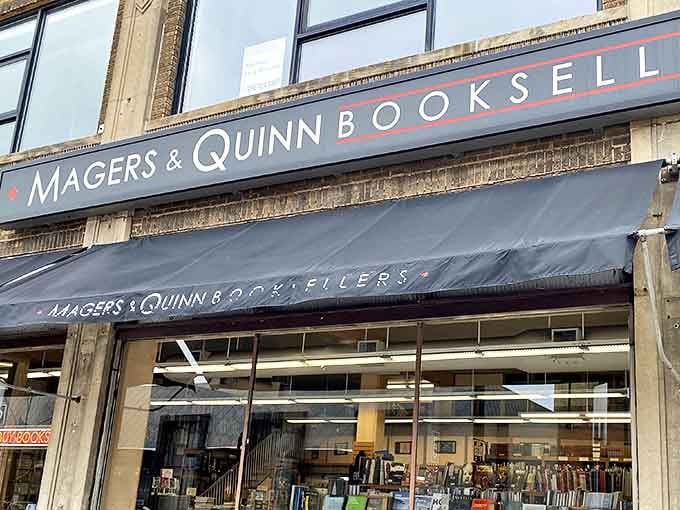 The iconic navy blue awning and signage of Magers & Quinn welcomes literary adventurers to Minneapolis's largest independent bookstore.