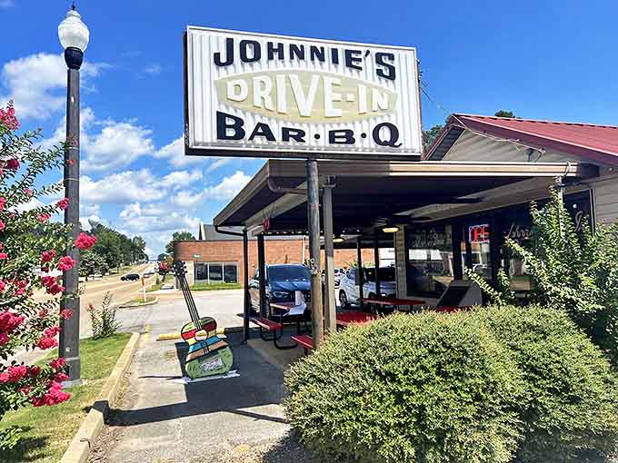 The weathered metal roof and humble facade of Johnnie's Drive In tell you everything you need to know&mdash;this place doesn't need fancy frills when the food speaks volumes.