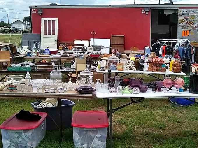 Tables laden with collectibles stretch toward a red building&mdash;treasure hunting at its finest, where one person's castoffs become another's conversation pieces.