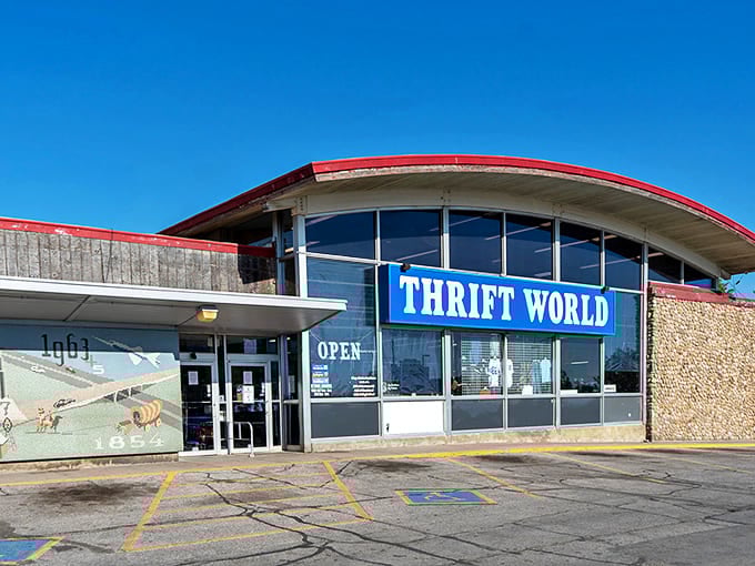 The curved roof and bold blue signage of Thrift World beckons bargain hunters like a retail lighthouse, promising treasures inside that won't shipwreck your budget.