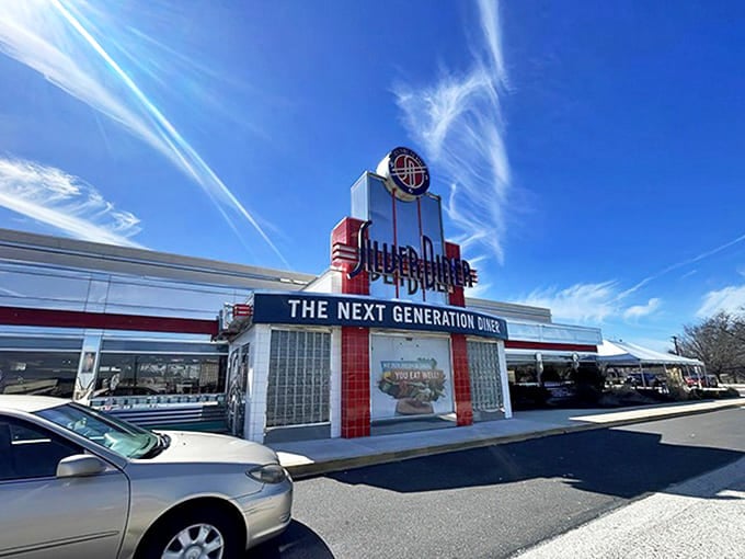 The iconic Silver Diner sign gleams against a brilliant blue New Jersey sky, promising retro charm with a modern twist that'll make your breakfast dreams come true.