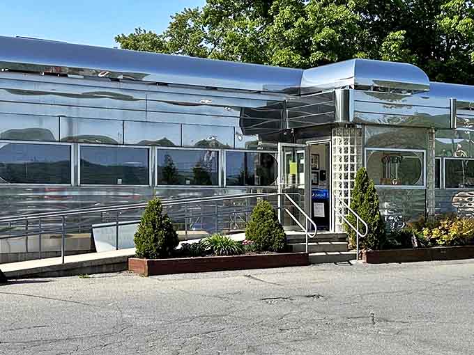 The gleaming stainless steel exterior isn't just eye-catching&mdash;it's a time machine disguised as architecture. Classic Americana at its finest.