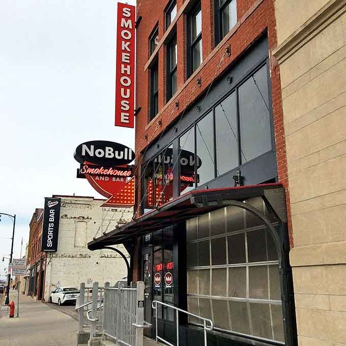 The iconic red "SMOKEHOUSE" sign beckons like a barbecue lighthouse, guiding hungry souls through downtown Fargo to meaty salvation.