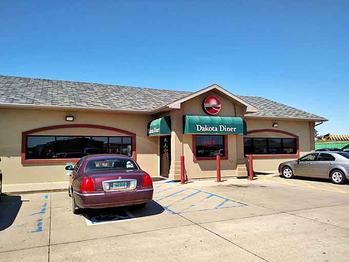 The humble beige exterior with its teal awning doesn't scream "culinary destination," but like your favorite uncle's stories, what's inside is what really counts.