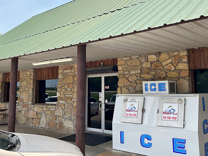 The rustic stone exterior of Arbuckle Mountain Fried Pies maintains its roadside charm, complete with an ice machine for travelers passing through.