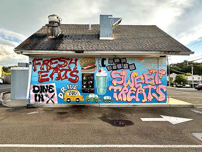 Art that speaks to your stomach! The colorful mural celebrating "Fresh Eats" and "Sweet Treats" might be the most honest advertising you'll ever see.