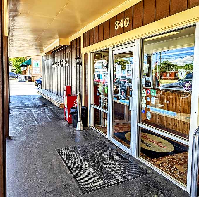 That classic wood paneling exterior isn't trying to impress anyone, which means the food inside has to do all the talking.