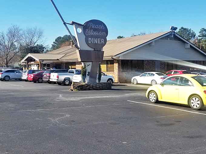 The iconic Peach Blossom Diner sign welcomes hungry visitors to this beloved Spartanburg institution where comfort food reigns supreme.