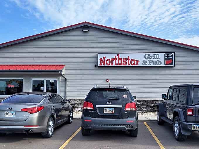 The unassuming exterior of Tinners Public House North might fool you, but those red umbrellas are practically semaphore flags signaling "deliciousness ahead!"