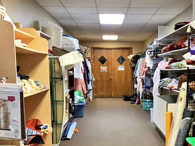 Behind-the-scenes glimpse of the thrift store's storage area, where tomorrow's treasures await their turn on the sales floor.