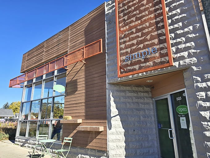 Modern meets rustic at Simple Caf&eacute;'s distinctive exterior, where wooden siding and floor-to-ceiling windows create an architectural hello that's impossible to ignore.