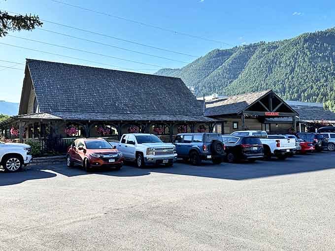 The Virginian's bustling parking lot proves its popularity &ndash; where pickup trucks and luxury SUVs share space beneath the Tetons.