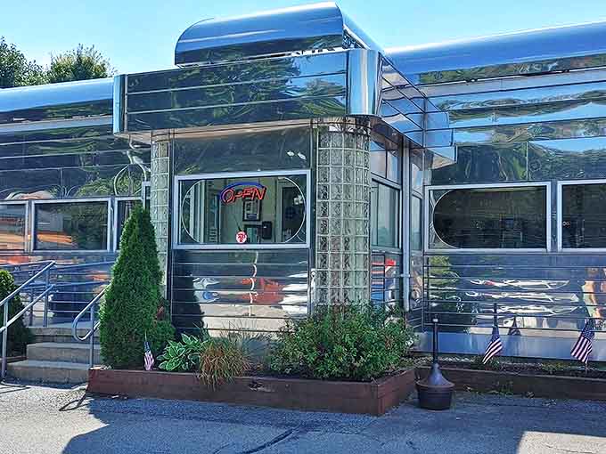 The gleaming stainless steel exterior isn't just eye-catching&mdash;it's a time machine disguised as architecture. Classic Americana at its finest.