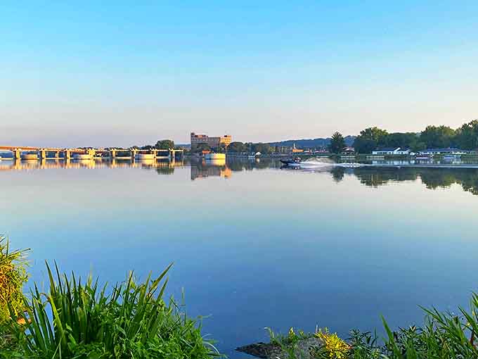 Mirror, mirror on the water &ndash; the Illinois River creates nature's perfect reflection pool at dawn, turning Marseilles into a watercolor painting come to life.