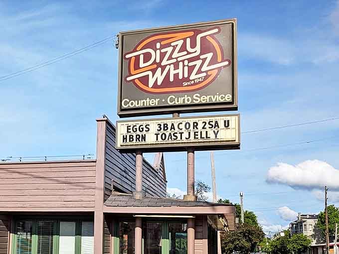The iconic Dizzy Whizz sign stands as a beacon of burger bliss in Louisville, promising comfort food that's remained gloriously unchanged while the world spins madly on.